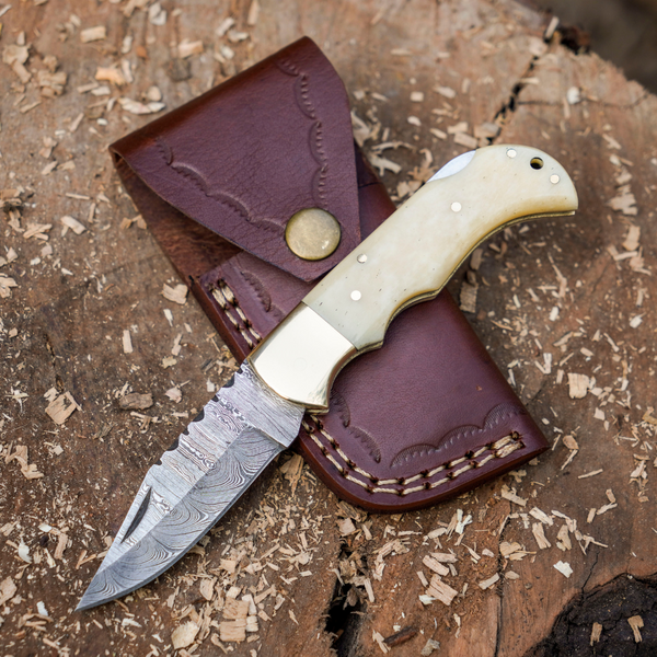 Skeletal Saber - Custom Hand Forged Damascus Folding Knife Engraved Br ...